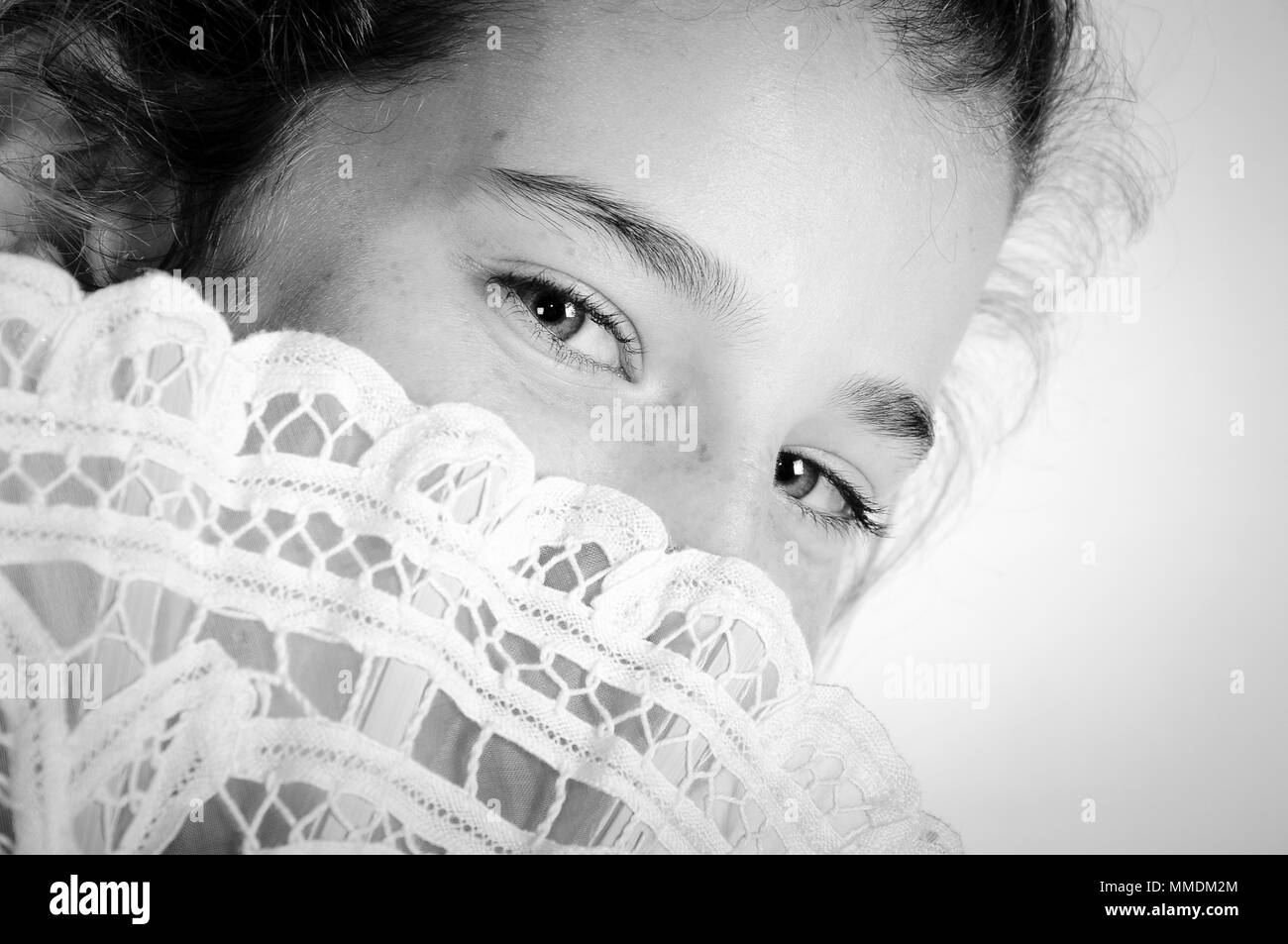 Face Behind Fan High Resolution Stock Photography and Images - Alamy