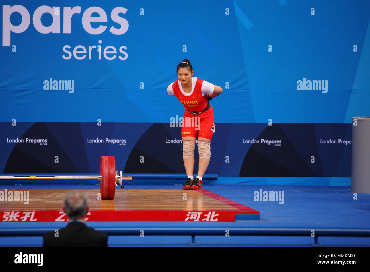 Yue Kang of China competes in the Women's 69kg weight lifting program ...