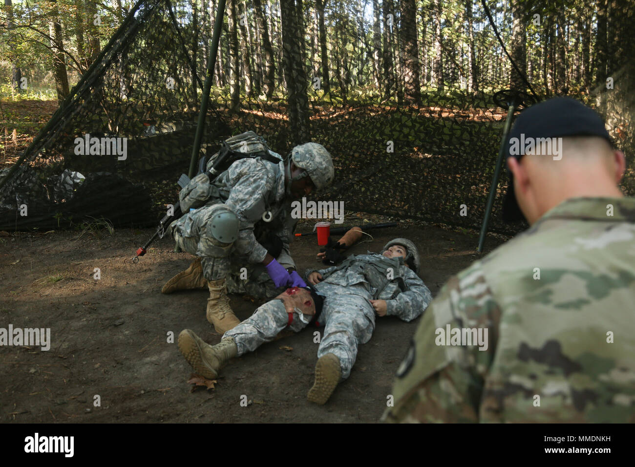 U.S. Army Soldier performs tactical field care during the Expert Field ...
