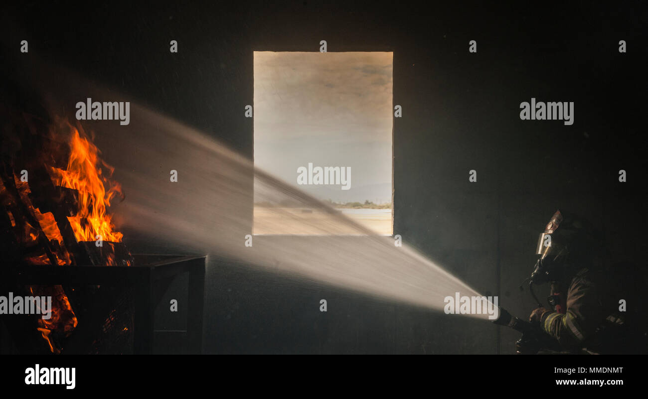 A U.S. Air Force firefighter from the 355th Civil Engineer Squadron ...