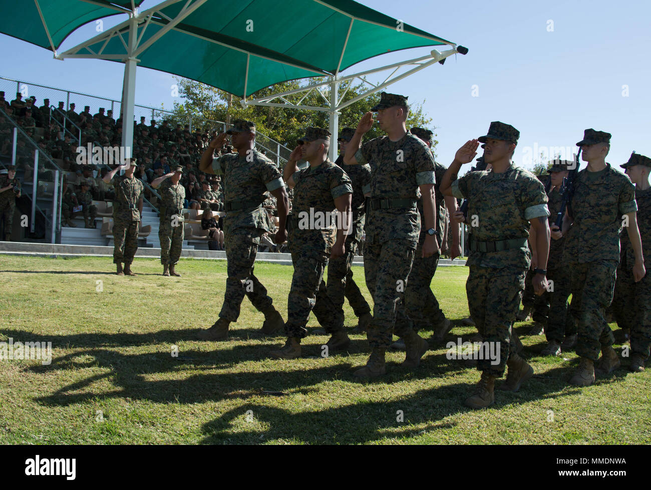 U.S. Marines render salute to Col. Kyle B. Ellison, left, and Col ...