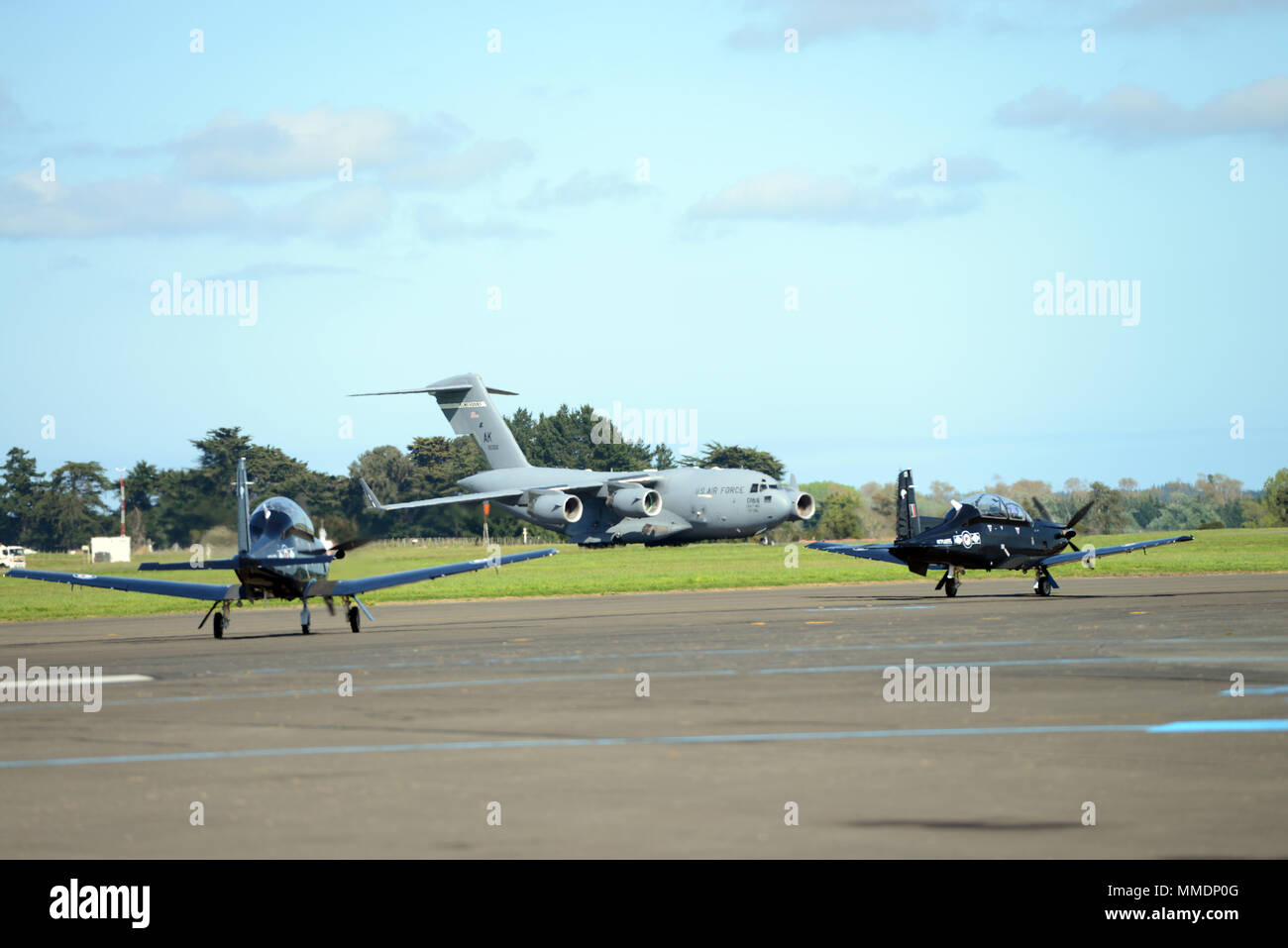 Royal New Zealand Air Force (RNZAF) T-6C Texan IIs taxi in front of a U ...