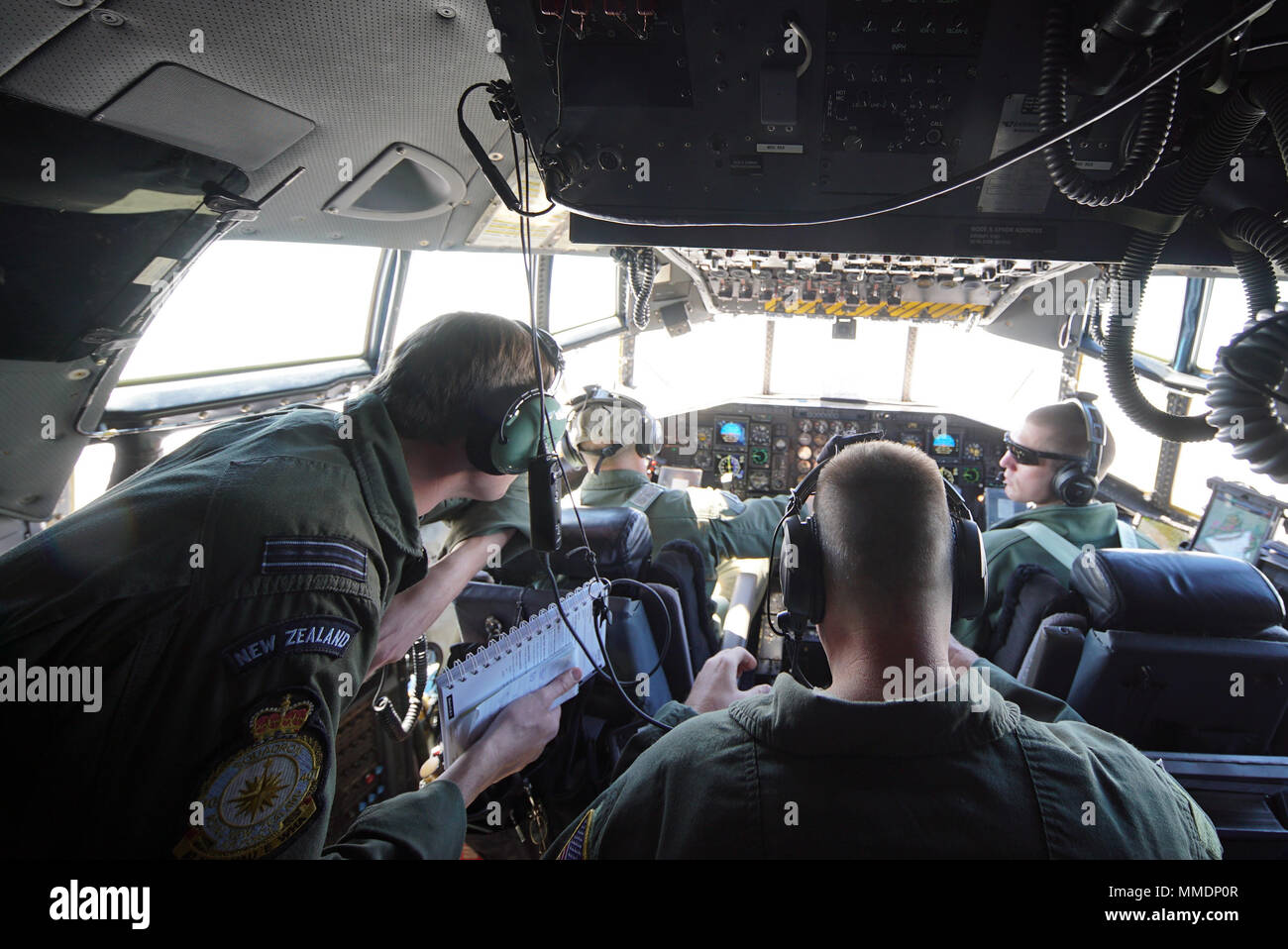 Royal New Zealand Air Force Flight Lt. Toby Mercer, air rider, advises ...