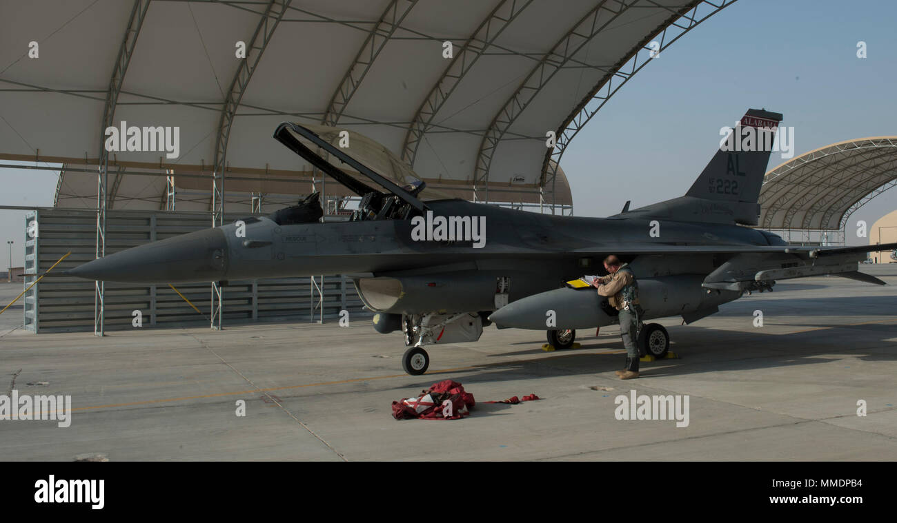 An F-16 Fighting Falcon pilot from the Alabama Air National Guard fills ...