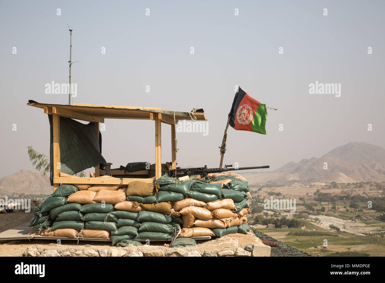 An Afghan flag flies over an observation post, Pekha Valley, Achin ...