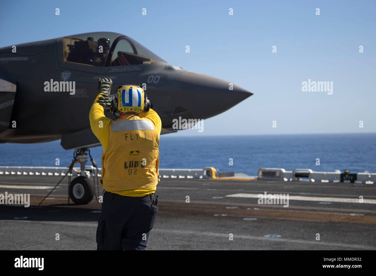 U.S. Navy Petty Officer 2nd Class Michael Orman, an aviation boatswain ...