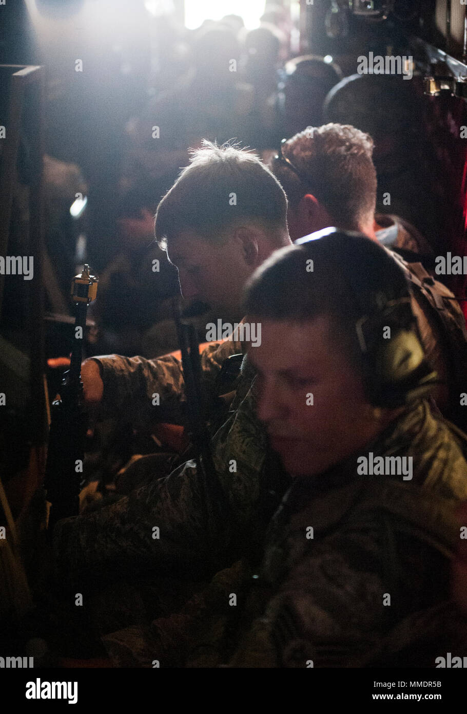 U.S. Air Force 36th Contingency Response Group (CRG) Airmen sit in the ...