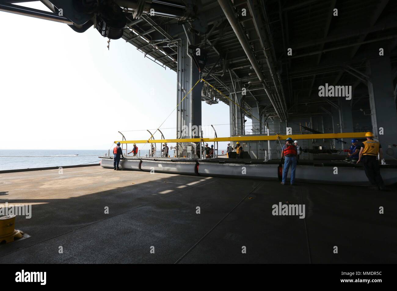 Sailors conduct a Small Vessel Operations Pier demonstration aboard USS ...
