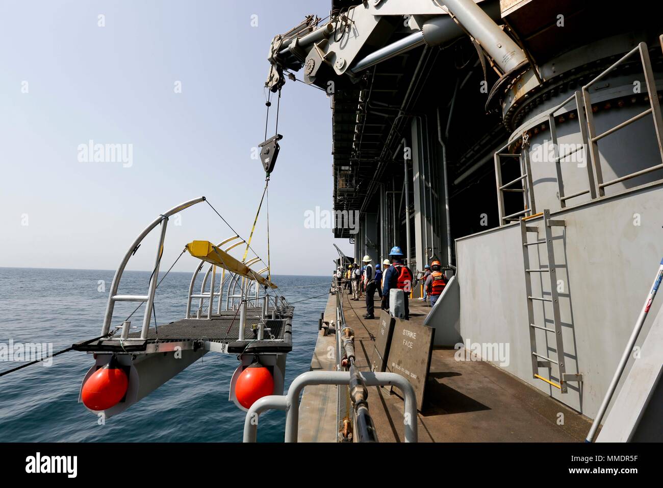 Sailors conduct a Small Vessel Operations Pier demonstration aboard USS ...