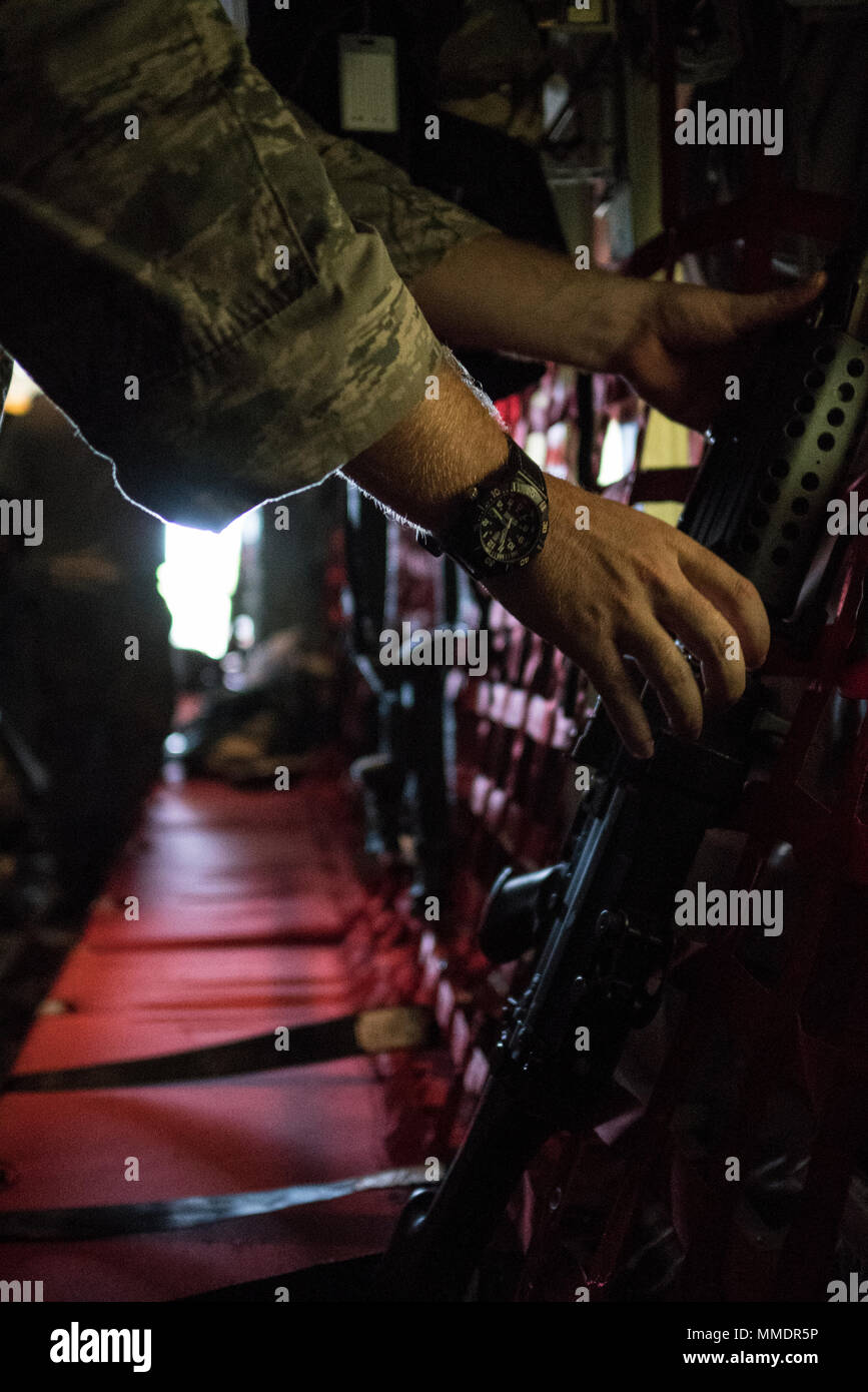 U.S. Air Force 36th Contingency Response Group (CRG) Airmen load gear ...