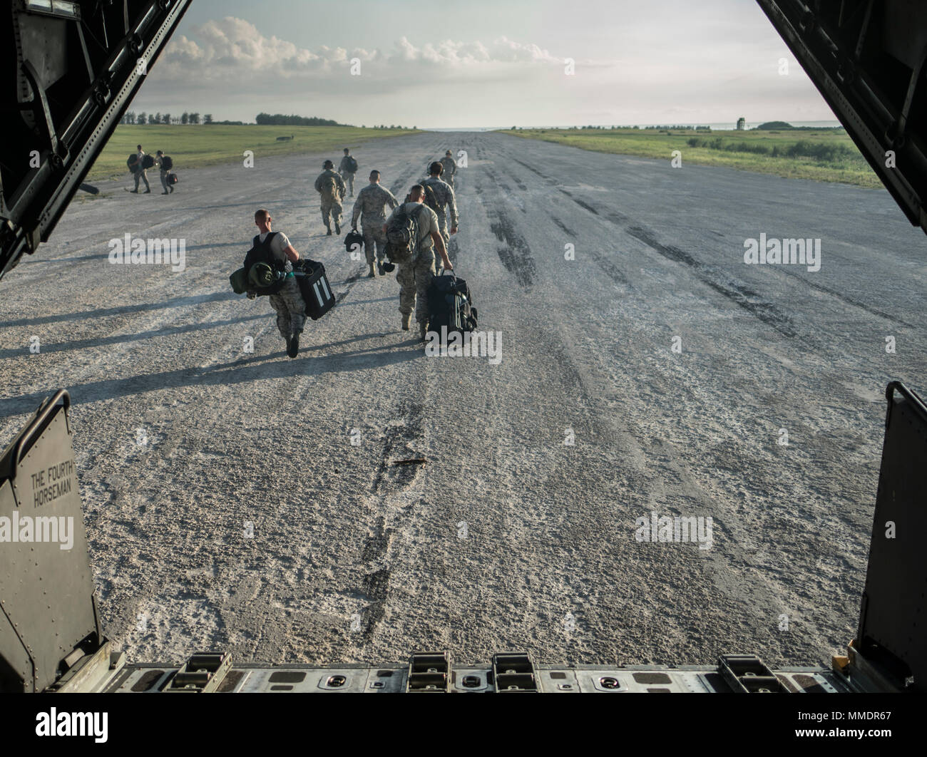 U.S. Air Force 36th Contingency Response Group (CRG) Airmen off-load ...