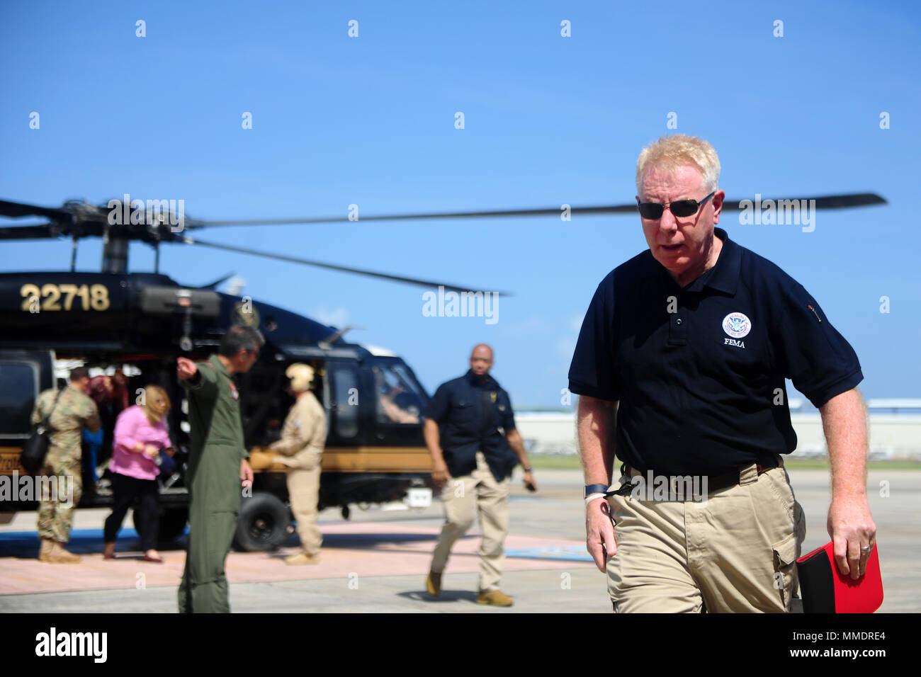 Federal Coordinating Officer Michael Byrne, FEMA, disembarks from a U.S ...
