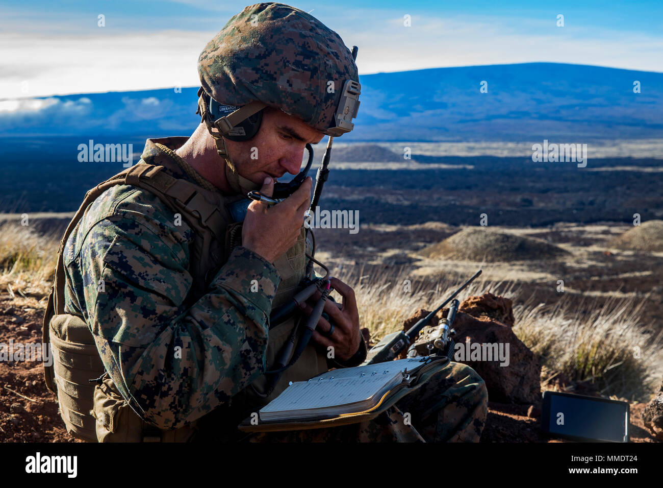 U.S. Marine Capt. Jacob Dunn makes a call for close air support at an ...