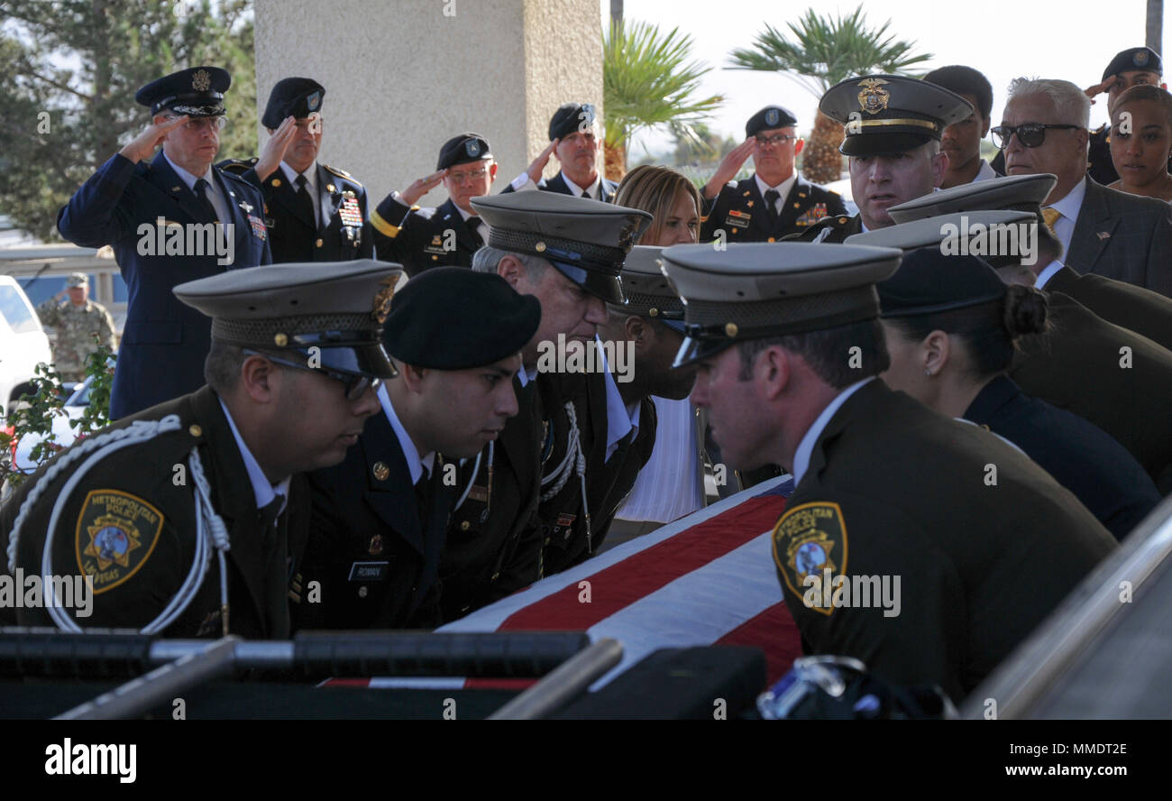 The senior leadership of the Nevada National Guard (background) salutes ...