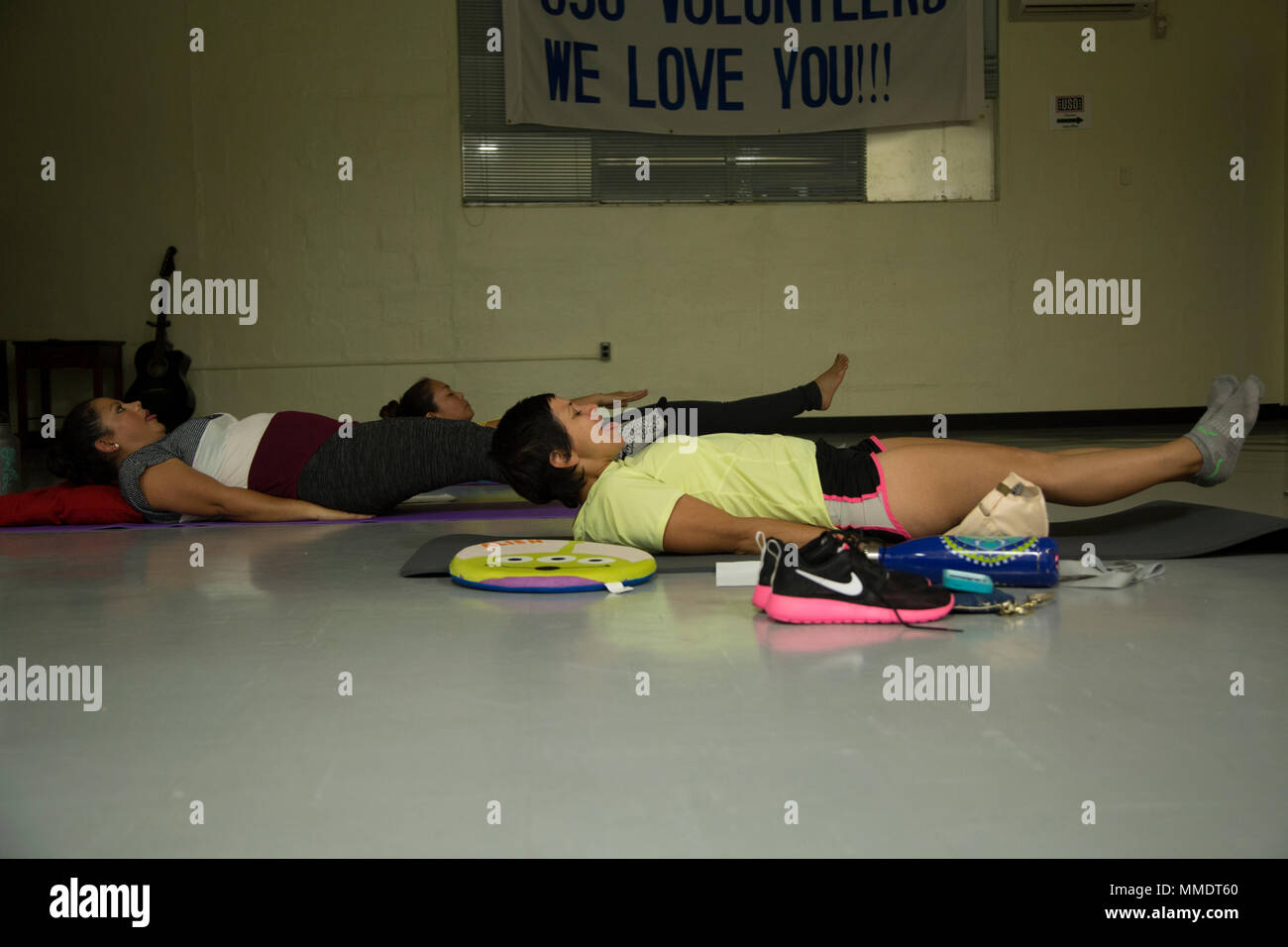 CAMP FOSTER, OKINAWA, Japan – The students combine a breathing exercise ...