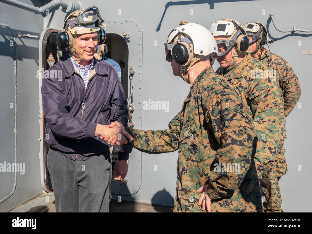 U.S. Marines welcome distinguished visitors to the observation deck ...