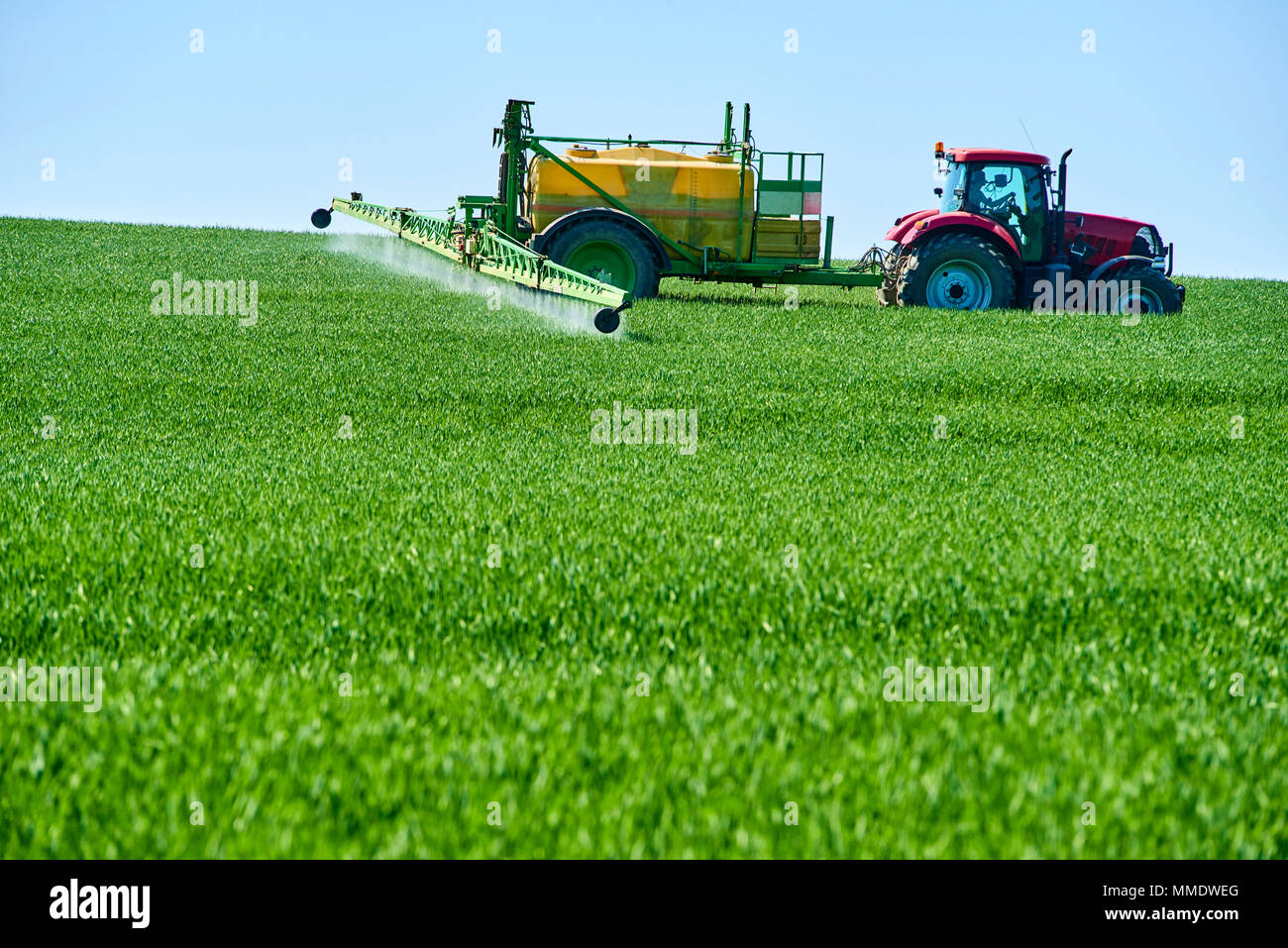 Spraying wheat hi-res stock photography and images - Alamy