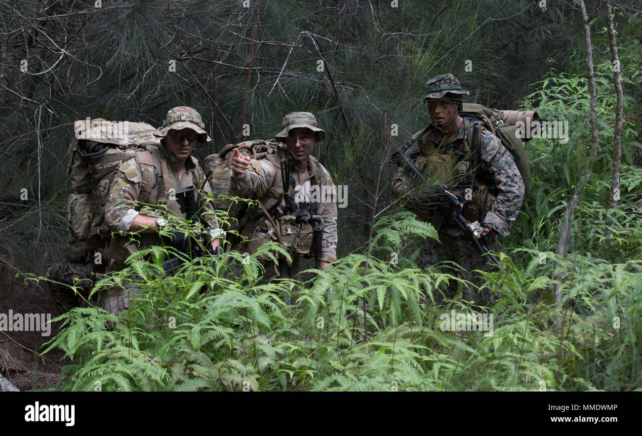 Members of the Recon Team Leaders Course (RTLC) discuss their route ...