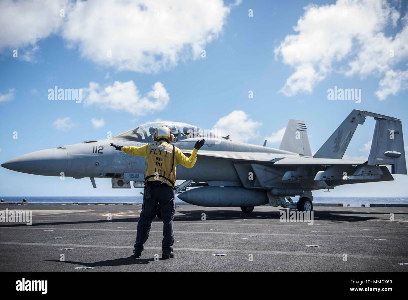 171020-N-MJ135-1071 PACIFIC OCEAN (Oct. 20, 2017) Aviation Boatswain’s Mate (Handling) 1st Class ...