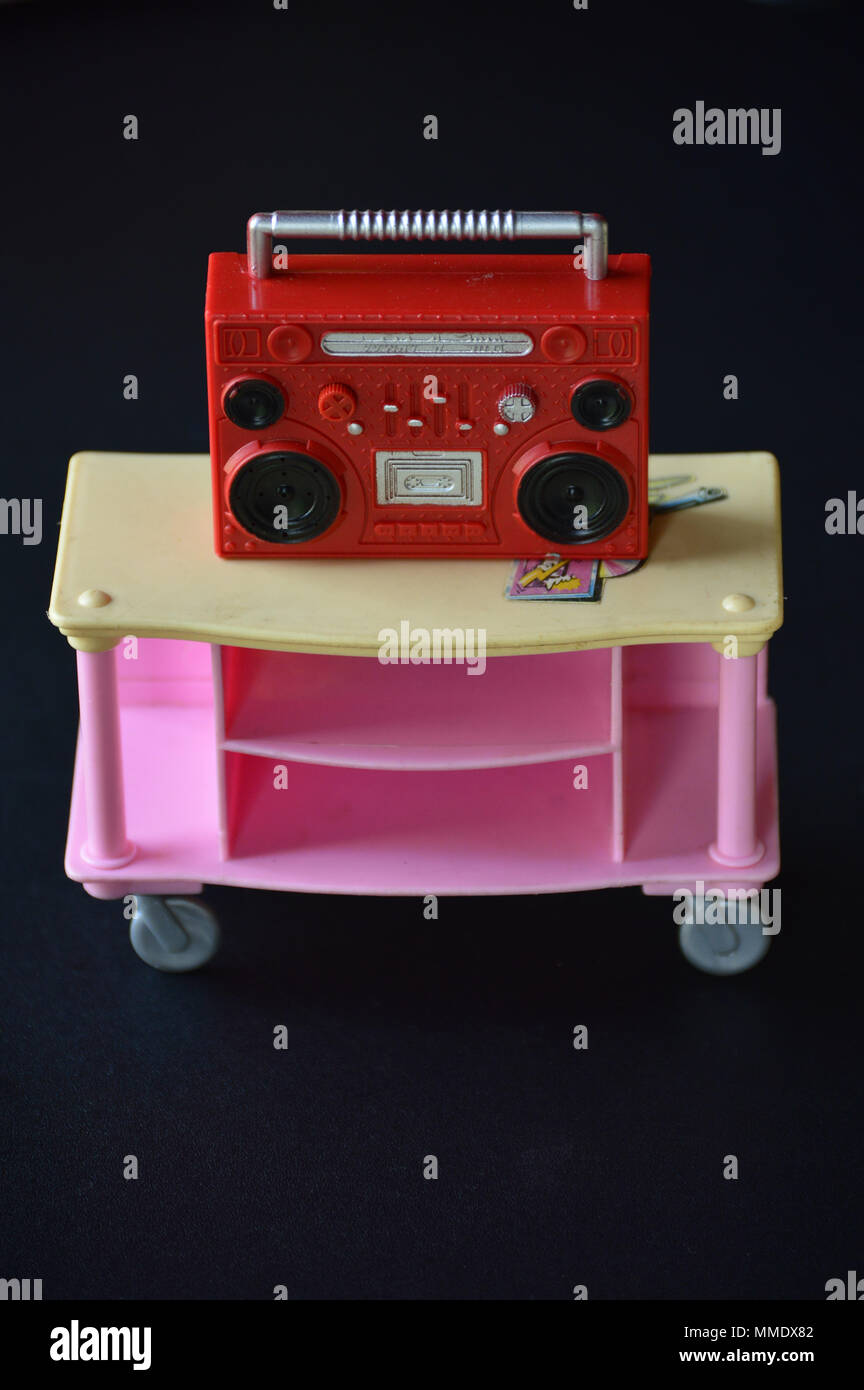 Red music player on black background Stock Photo - Alamy