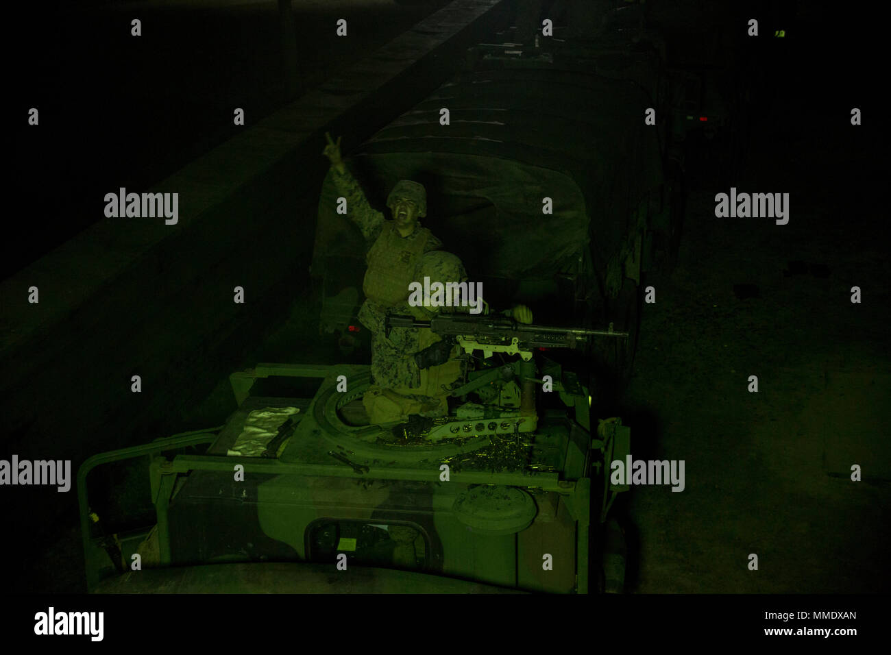 A Marine with Marine Air Support Squadron 2 shouts at the range tower ...