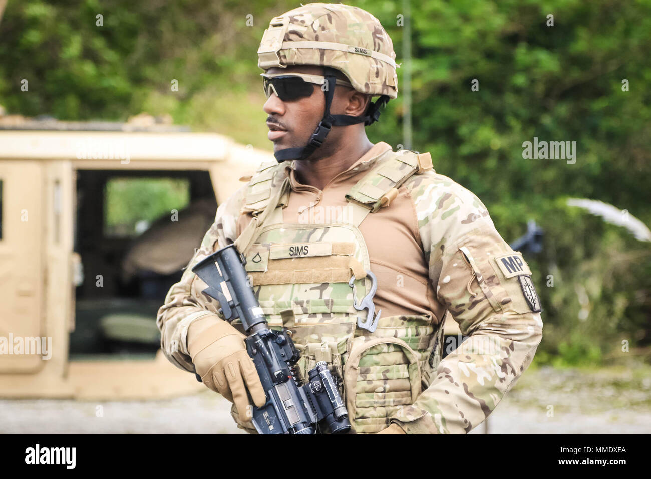U.S. Soldier with the 58th Military Police Company, gets ready for a ...