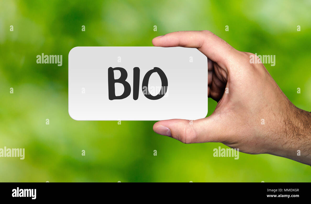 Hand holding placard with word "BIO". BIO concept. Vector stock Stock ...