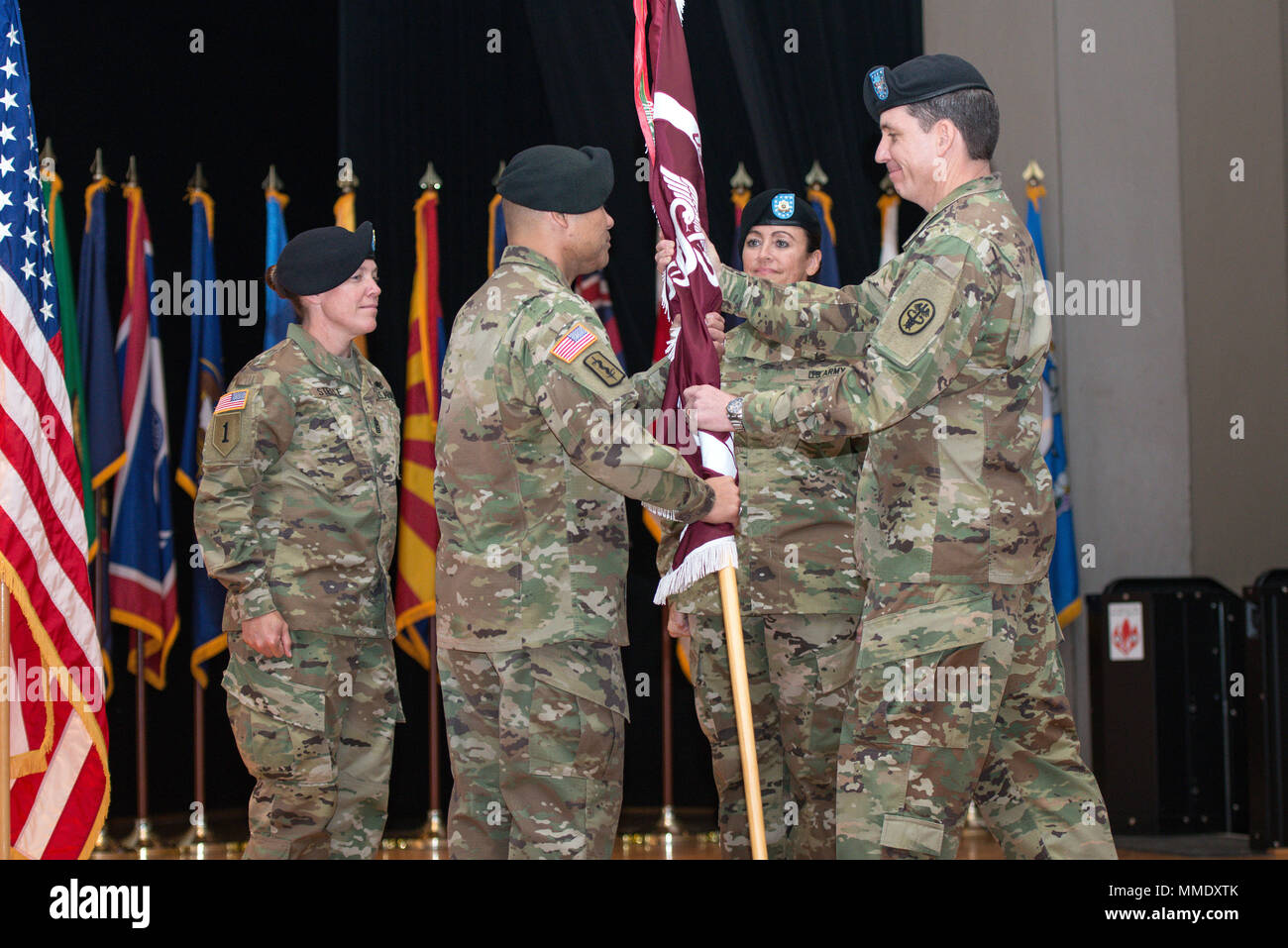 COL Kevin Bass hand the battalion flag to CSM Art Santos during the USA ...