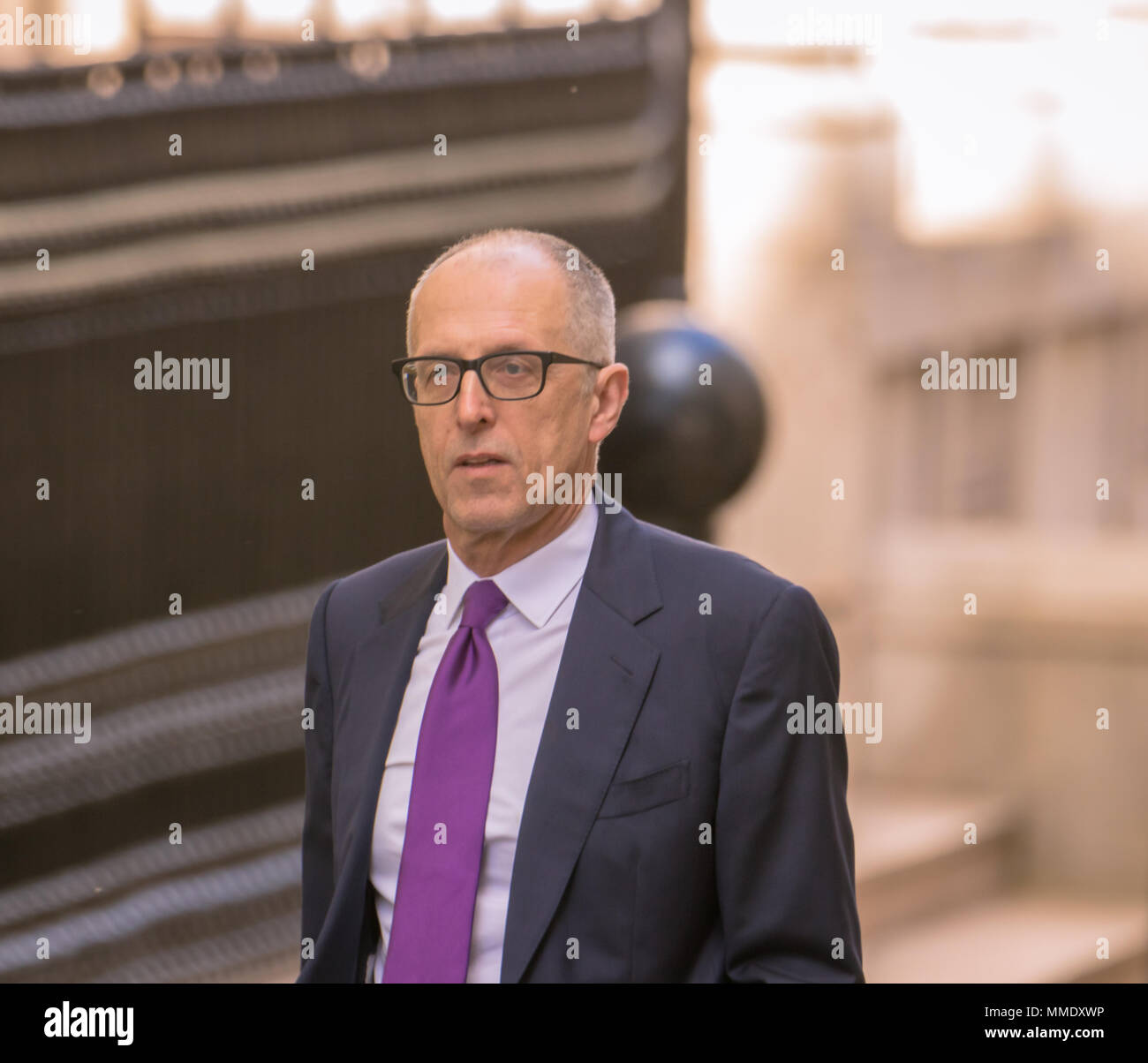 A Suited Man Walking Up To Number 10 Downing Street In London, United ...