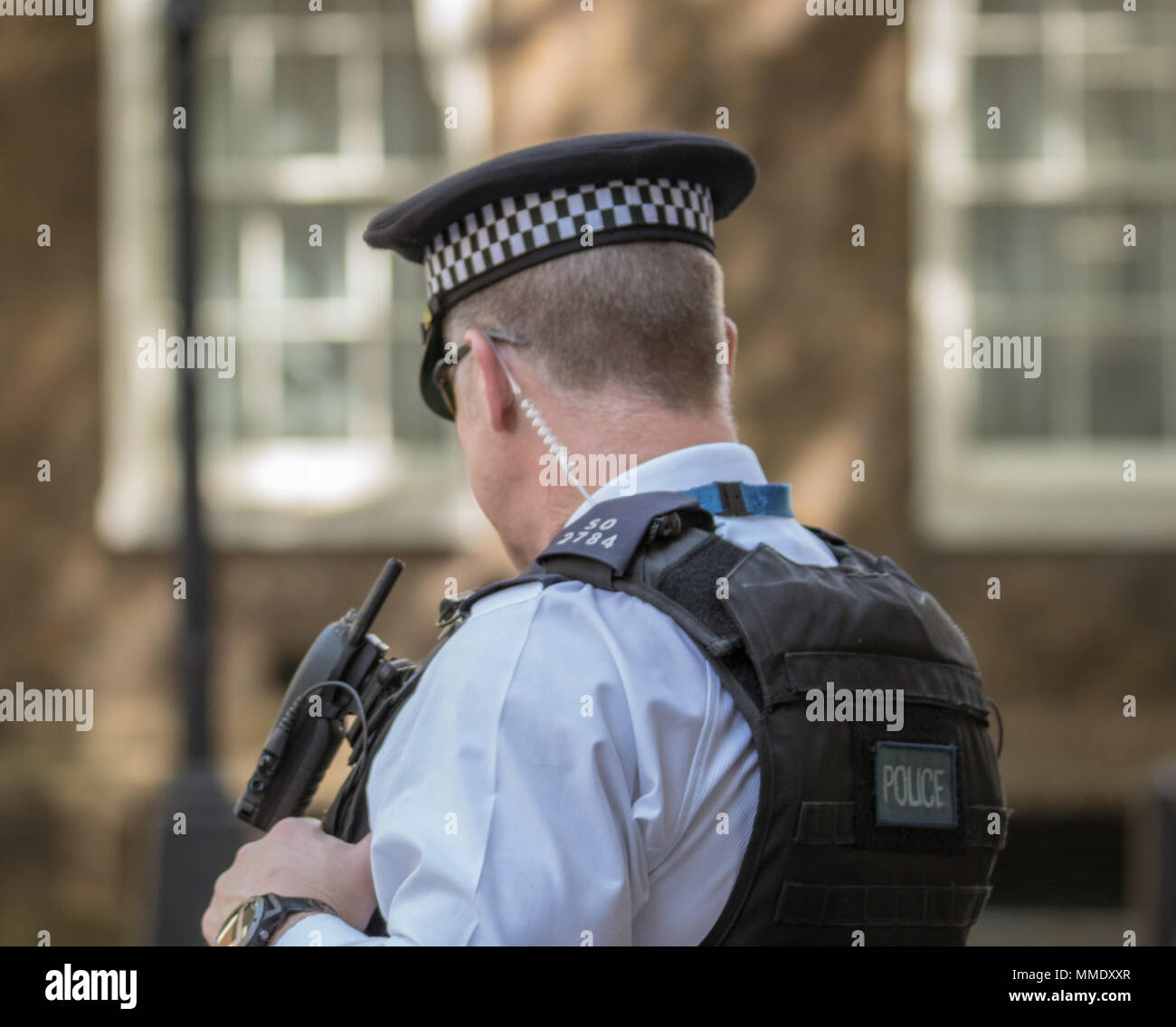 Side View Of A Police Officer Outside Of Number 10 Downing Street In ...