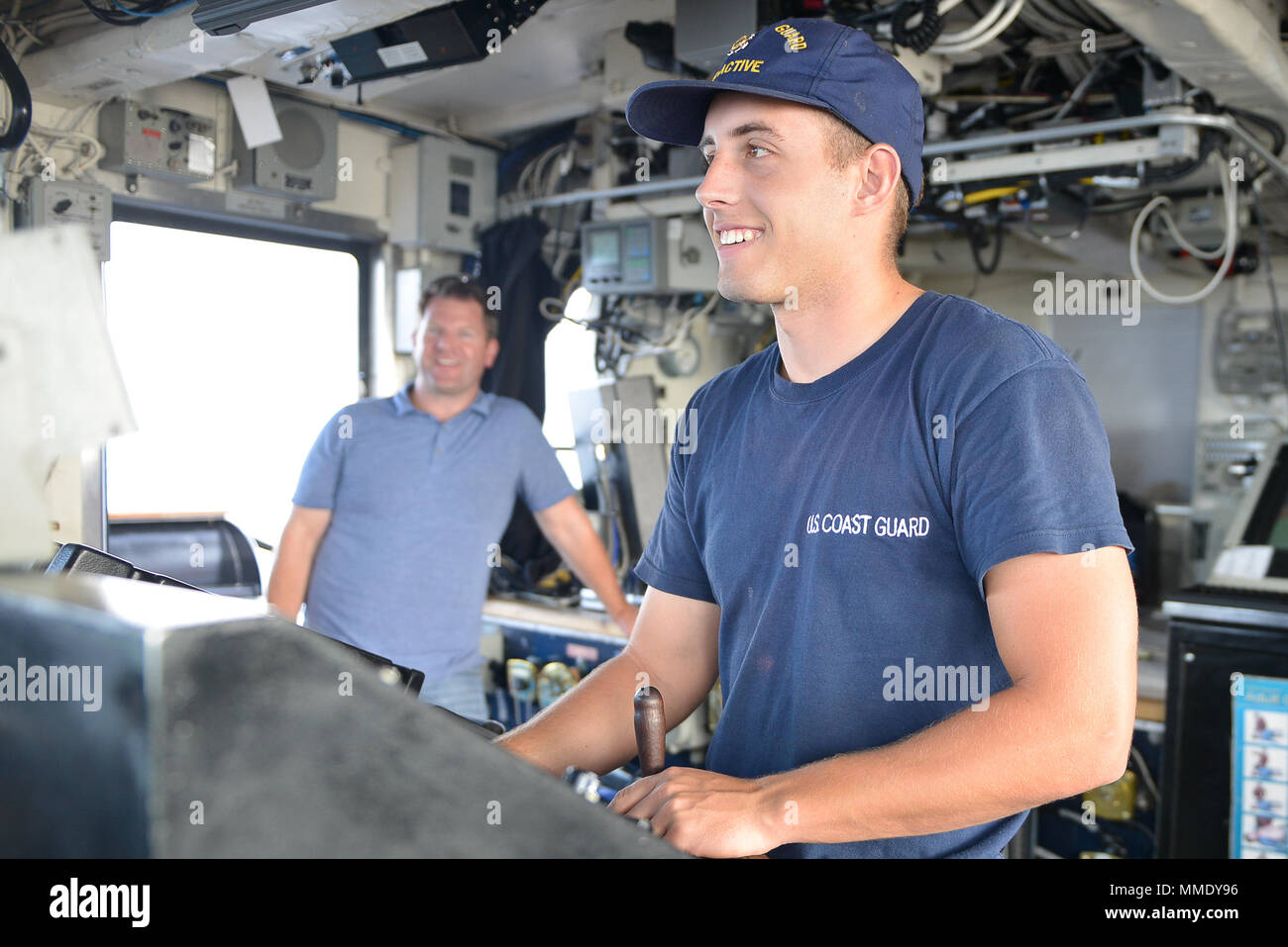 Seaman Eric Jackson stands helm watch on Coast Guard cutter Active ...