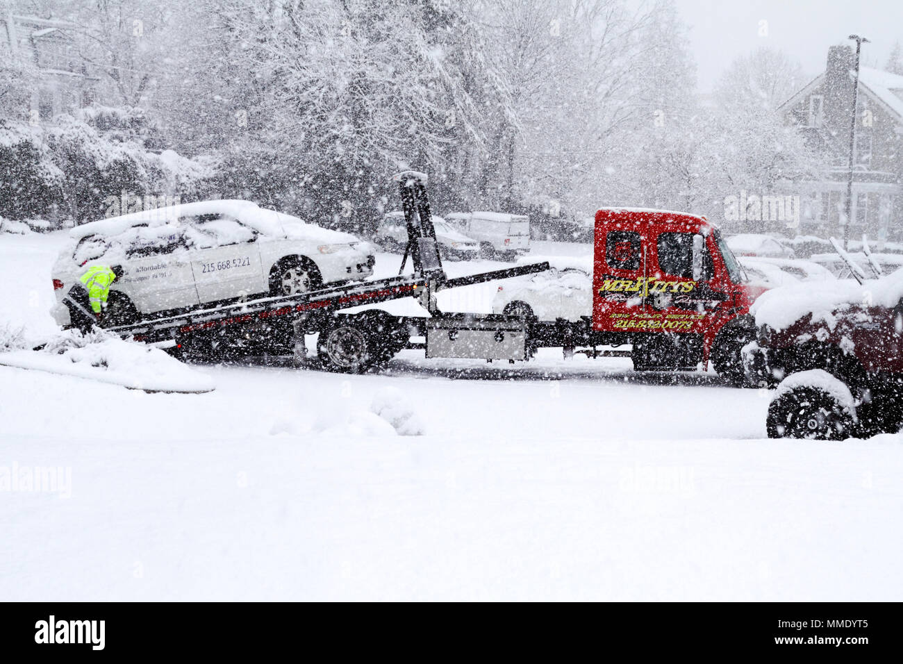 Towing in snow hi-res stock photography and images - Alamy