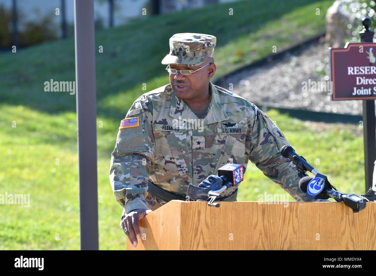 Brigadier General David Fleming addresses friends and family at the ...