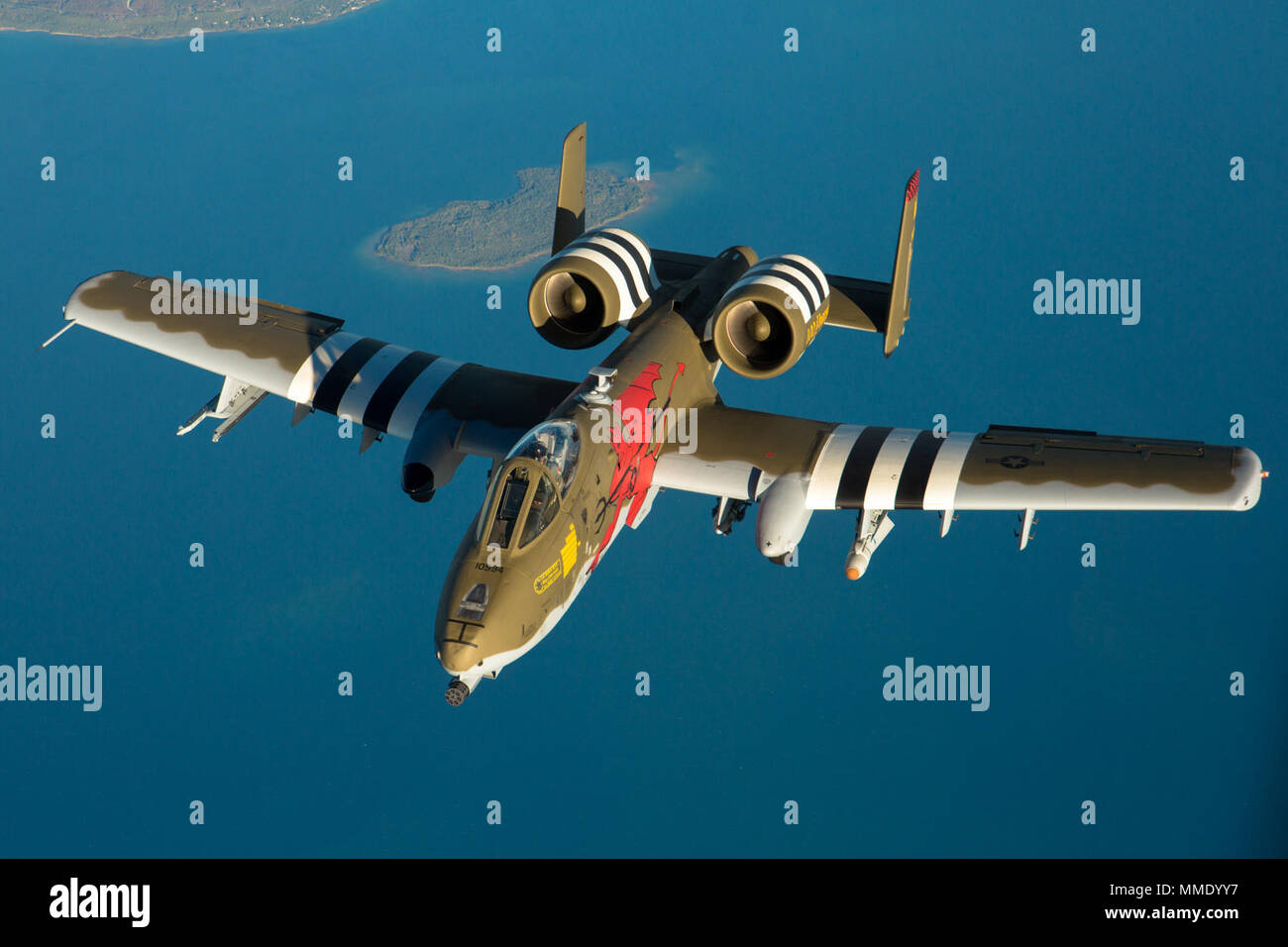 An A-10 with the 107th Fighter Squadron, flies with a KC-135 ...
