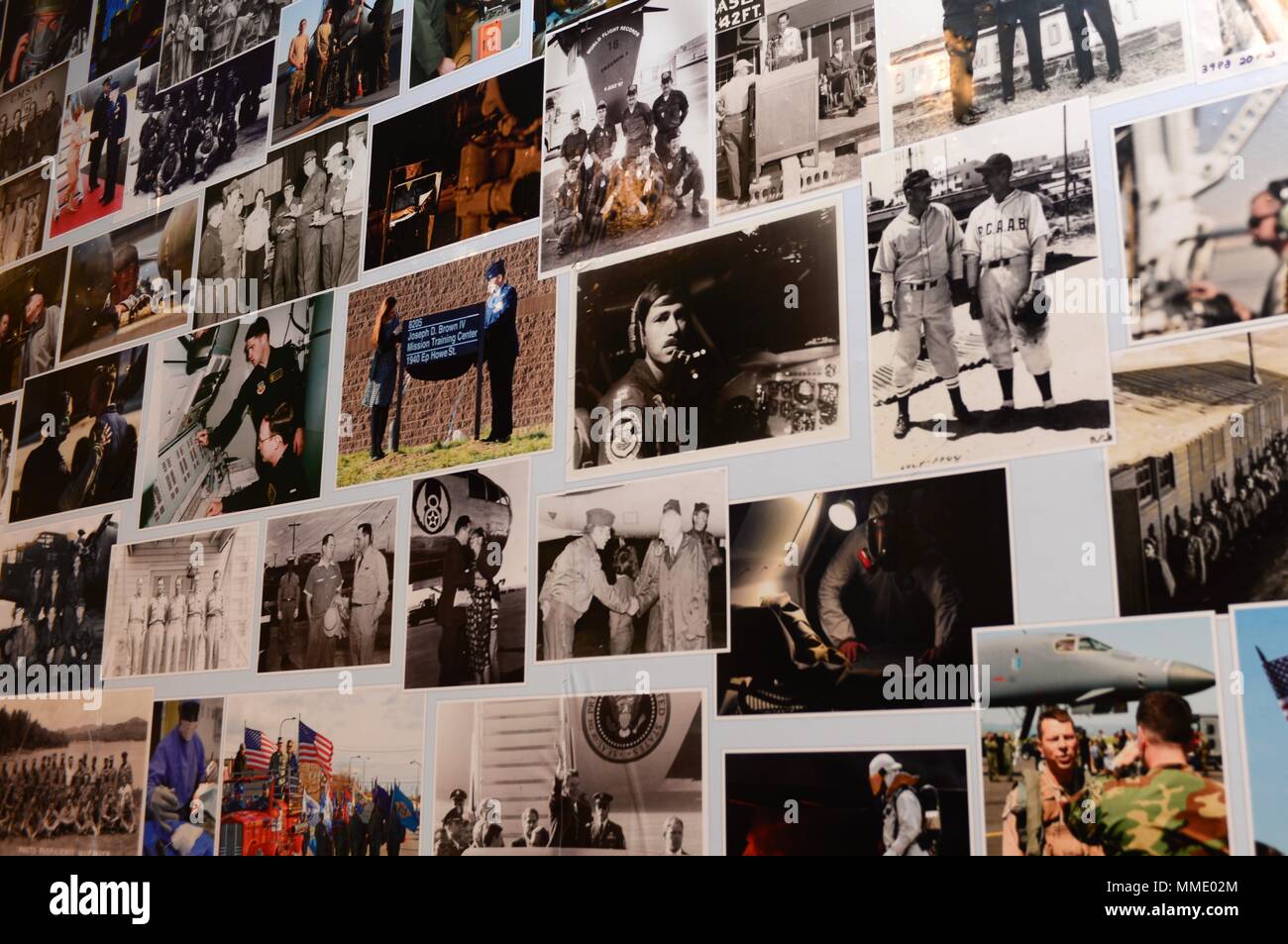 Photos depicting the history of Ellsworth Air Force Base adorn a wall ...