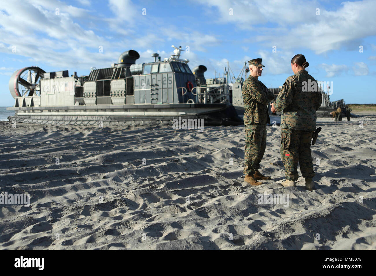 U.S. Marine Corps Col. Boyd A. Miller, left, Headquarters Regiment (HQ ...