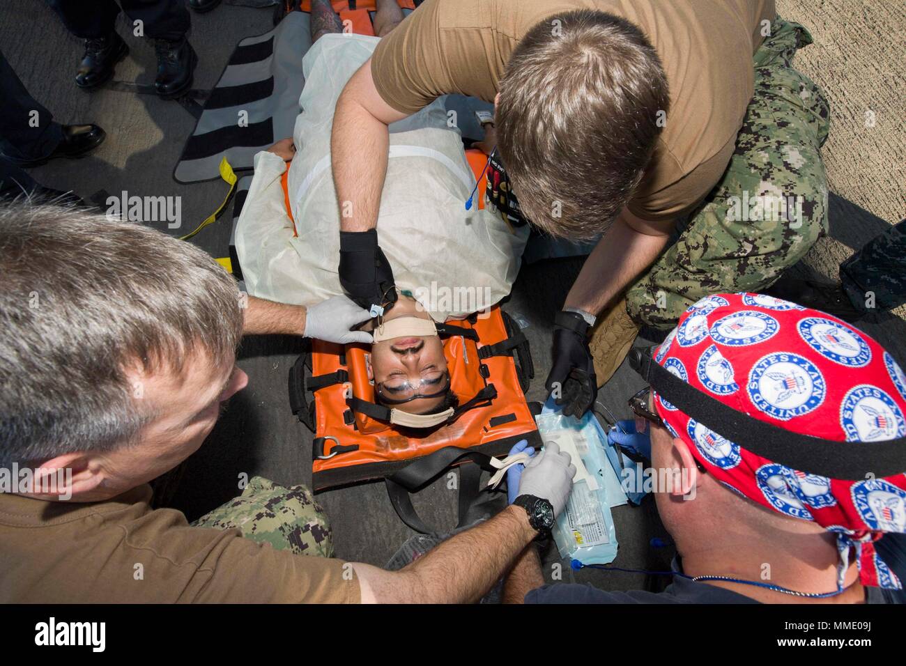 PACIFIC OCEAN (Oct. 23, 2017) Lt. Thomas Diggs (left), Hospital ...