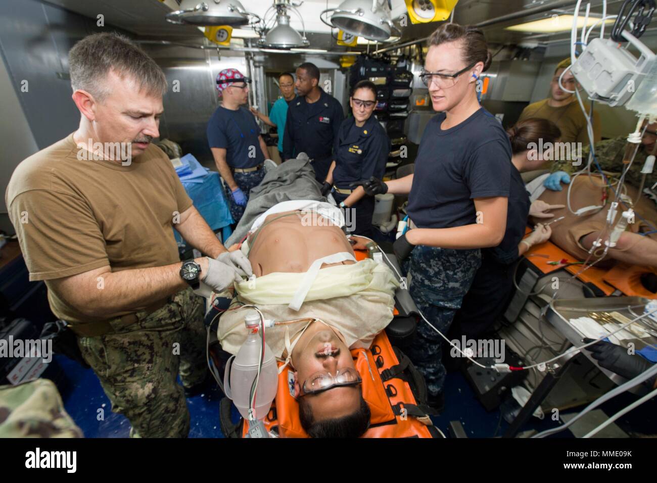 PACIFIC OCEAN (Oct. 23, 2017) Lt. Thomas Diggs (left) and Ltjg. Mia ...