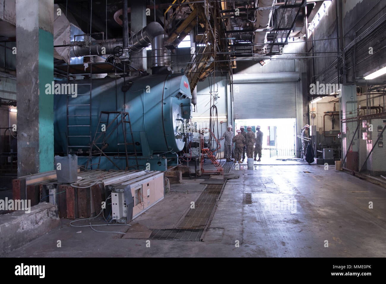 The U.S. Army Corps of Engineers, Prime Power team walks through Puerto ...