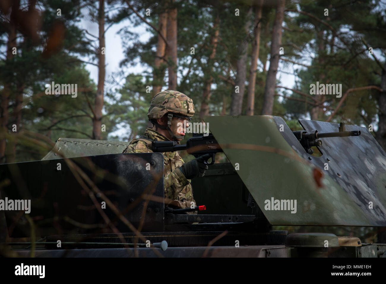 U.S. Army Pvt. Johnny Hopkins, assigned to the 615th Military Police ...