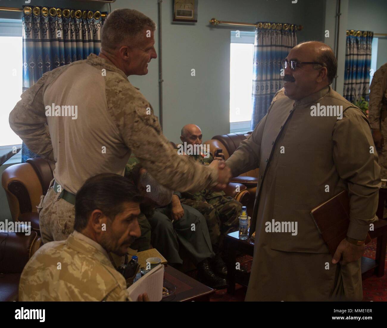 U.S. Marine Brig. Gen. Roger Turner, left, the commanding general of ...
