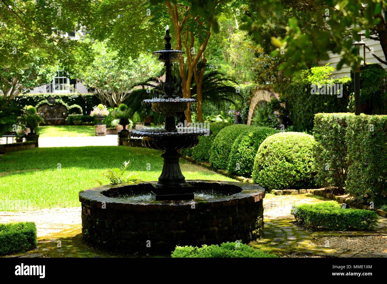 Summer Fountain - Summer view of a water fountain in a quiet small ...