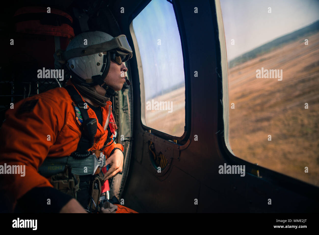 Naval Aircrewman (Helicopter) 2nd Class Francisco Toledo assigned to ...