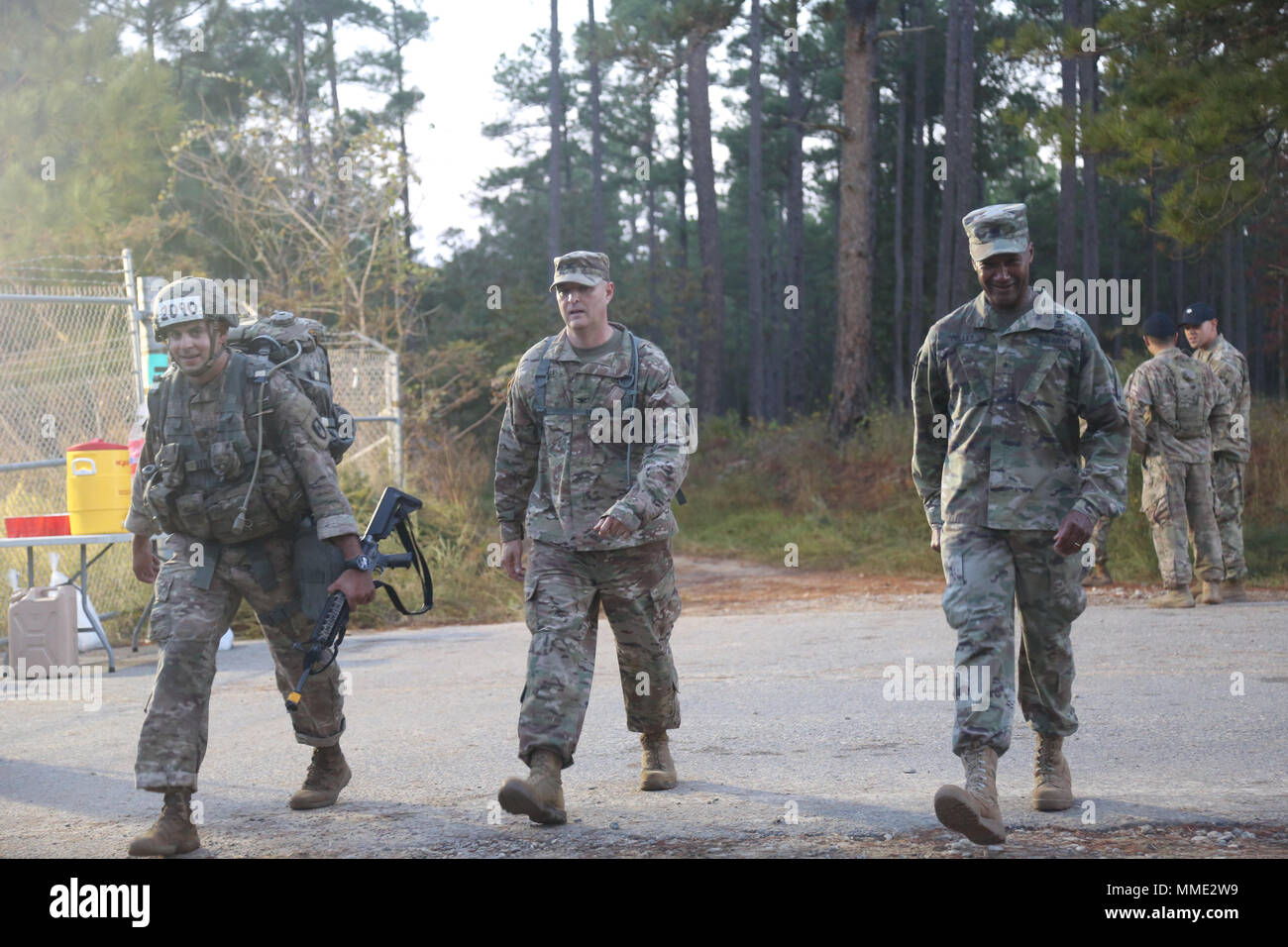 U.S. Army Soldiers participate in a twelve mile ruck march as part of ...