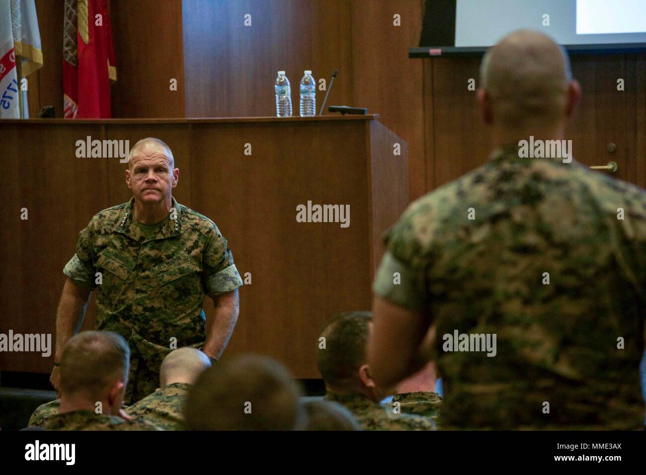 Commandant of the Marine Corps Gen. Robert B. Neller listens to ...
