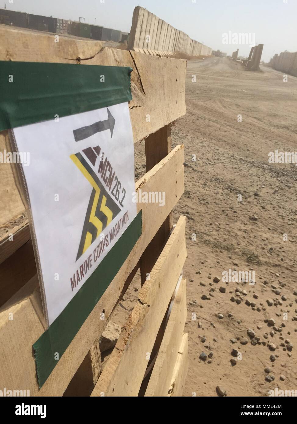 QAYYARAH AIRFIELD, Iraq – A sign directs runners of the Marine Corps ...