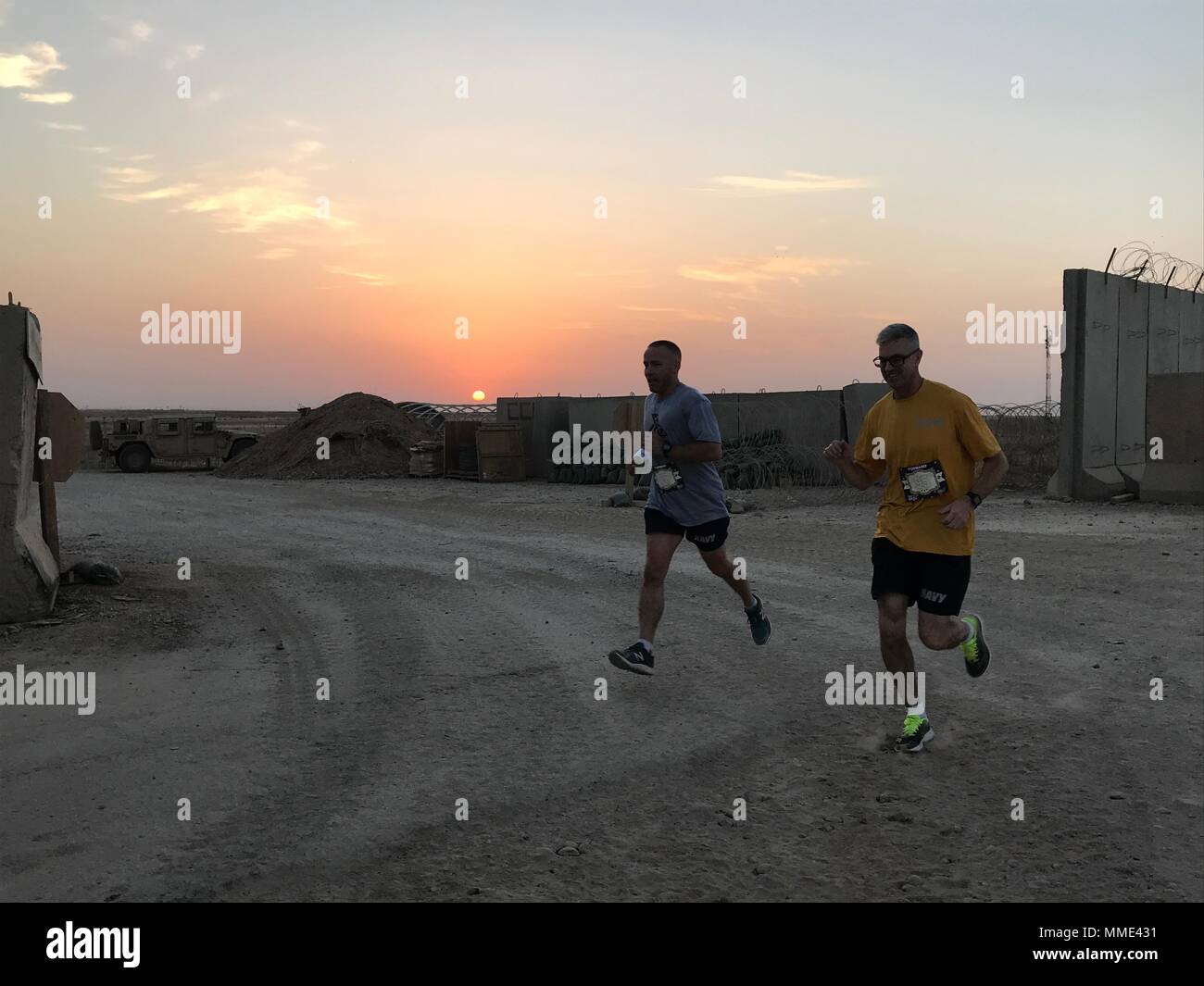 QAYYARAH AIRFIELD, Iraq – Sailors run the Marine Corps Marathon Forward ...