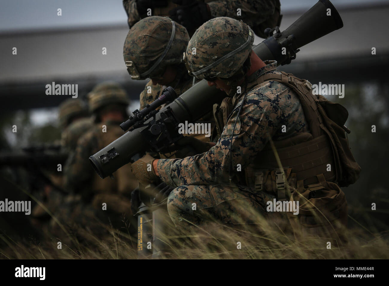 U.S. Marines reload the Carl Gustav rocket system during live fire ...