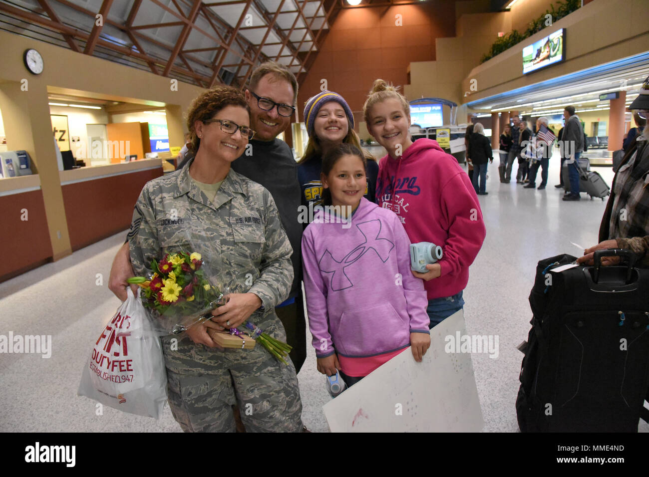 Master Sgt. Stacey Lockwood, of the 119th Wing, is surrounded by her ...