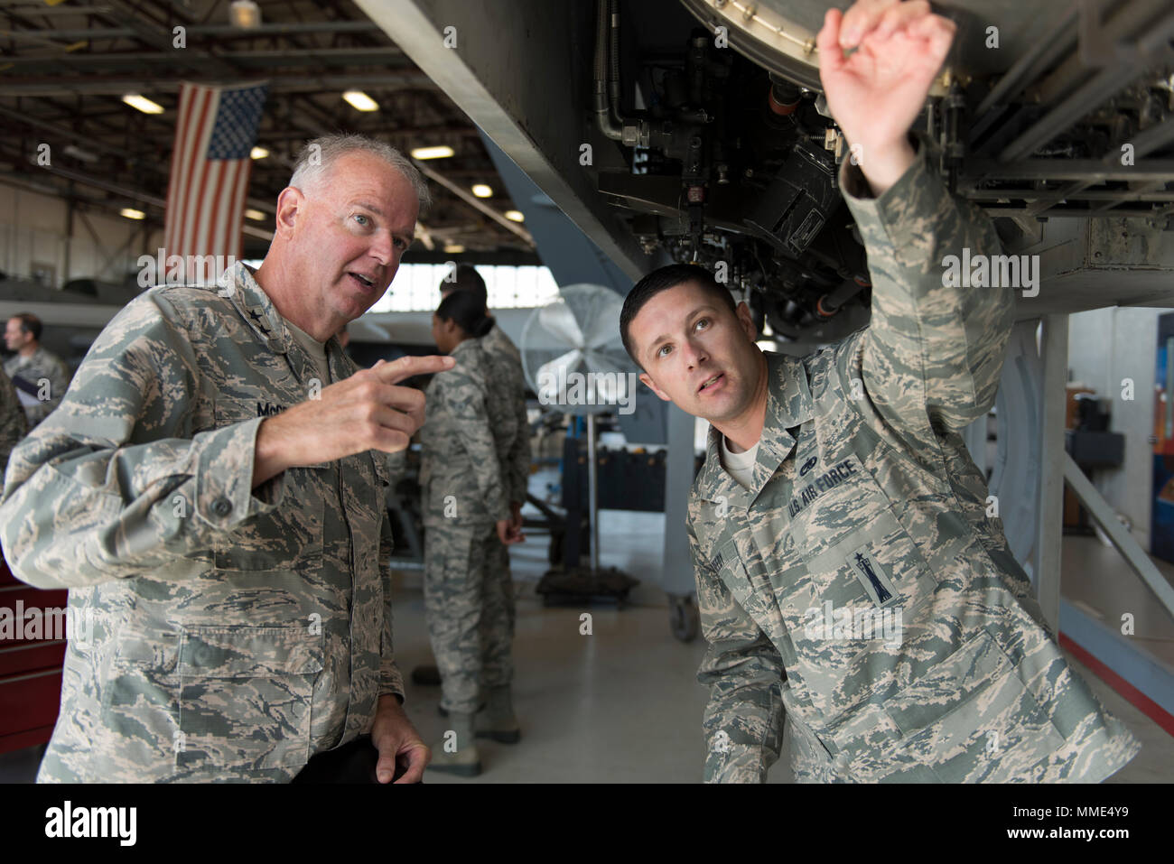 Tech Sgt. Matthew Reedy, 363rd Training Squadron instructor, briefs Maj. Gen. John McCoy, Air ...